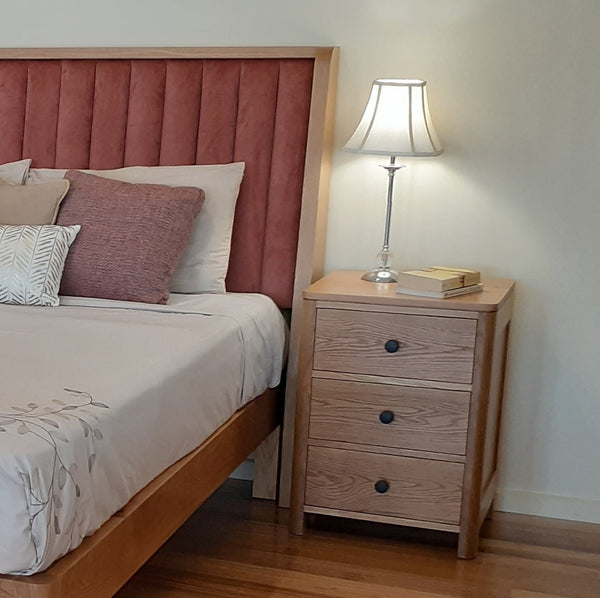 Solid timber bedside table in classic styling and blond timber, with ...